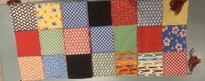 Patchwork Table Runner with Tassels Made on Your Serger